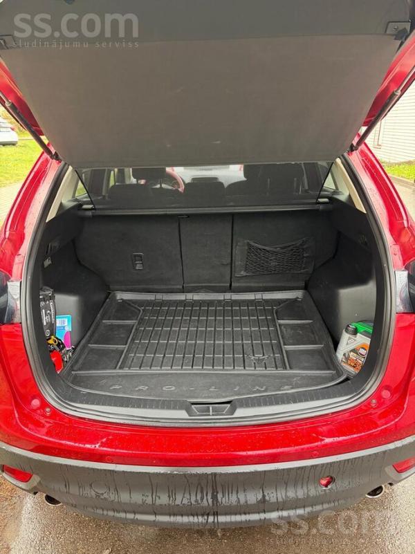 Red Mazda CX-5 2014 in Riga, with an engine capacity of 2.20 L and mileage of 234 thousand km for 6000 €, photo 9 on AUTOMOTO.COM.LV