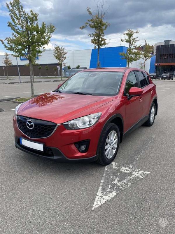 Red Mazda CX-5 2014 in Klaipeda, with an engine capacity of 2.19 L and mileage of 279 thousand km for 5600 €, photo 1 on AUTOMOTO.COM.LV