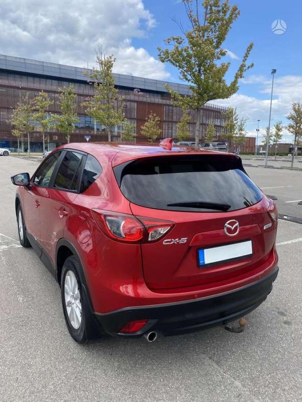 Red Mazda CX-5 2014 in Klaipeda, with an engine capacity of 2.19 L and mileage of 279 thousand km for 5600 €, photo 5 on AUTOMOTO.COM.LV