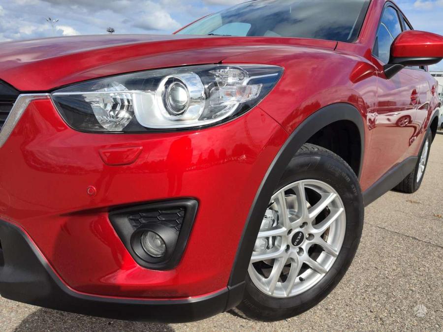 Red Mazda CX-5 2014 in Marijampole, with an engine capacity of 2.19 L and mileage of 255 thousand km for 7800 €, photo 3 on AUTOMOTO.COM.LV