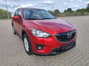 Red Mazda CX-5 2014 in Marijampole, with an engine capacity of 2.19 L and mileage of 255 thousand km for 7800 €, photo 4 on AUTOMOTO.COM.LV