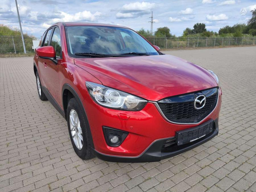 Red Mazda CX-5 2014 in Marijampole, with an engine capacity of 2.19 L and mileage of 255 thousand km for 7800 €, photo 4 on AUTOMOTO.COM.LV