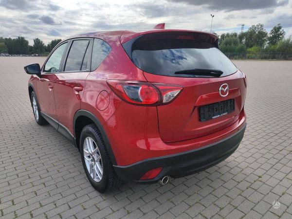 Red Mazda CX-5 2014 in Marijampole, with an engine capacity of 2.19 L and mileage of 255 thousand km for 7800 €, photo 4 on AUTOMOTO.COM.LV