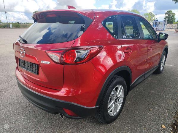 Red Mazda CX-5 2014 in Marijampole, with an engine capacity of 2.19 L and mileage of 255 thousand km for 7800 €, photo 5 on AUTOMOTO.COM.LV