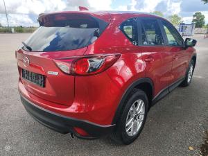 Red Mazda CX-5 2014 in Marijampole, with an engine capacity of 2.19 L and mileage of 255 thousand km for 7800 €, photo 6 on AUTOMOTO.COM.LV