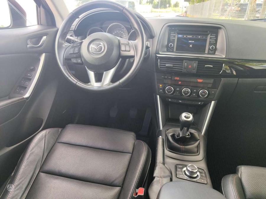 Red Mazda CX-5 2014 in Marijampole, with an engine capacity of 2.19 L and mileage of 255 thousand km for 7800 €, photo 7 on AUTOMOTO.COM.LV