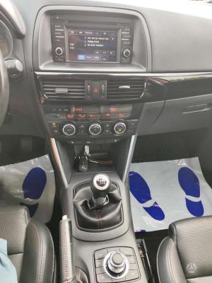 Red Mazda CX-5 2014 in Marijampole, with an engine capacity of 2.19 L and mileage of 255 thousand km for 7800 €, photo 10 on AUTOMOTO.COM.LV