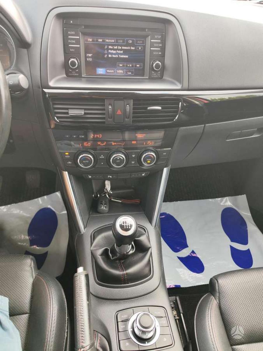 Red Mazda CX-5 2014 in Marijampole, with an engine capacity of 2.19 L and mileage of 255 thousand km for 7800 €, photo 10 on AUTOMOTO.COM.LV