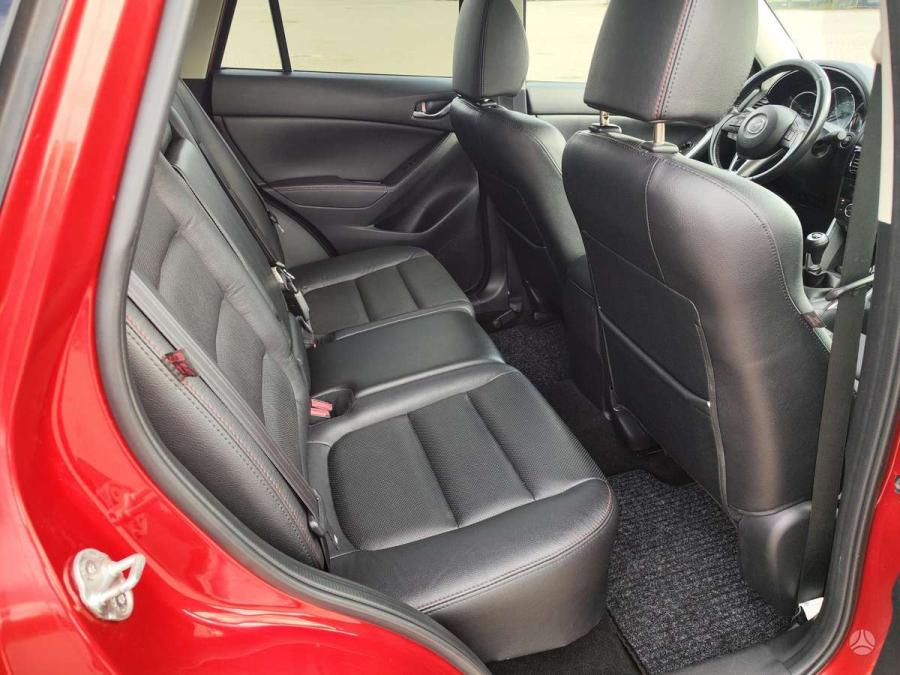 Red Mazda CX-5 2014 in Marijampole, with an engine capacity of 2.19 L and mileage of 255 thousand km for 7800 €, photo 14 on AUTOMOTO.COM.LV