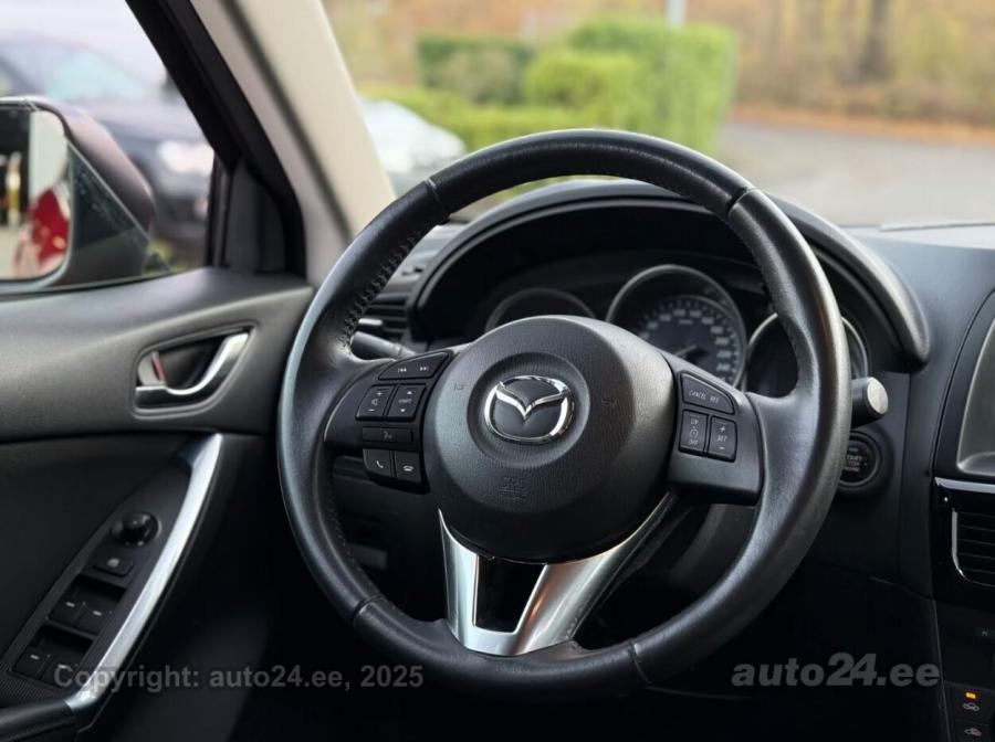 Sarkans Mazda CX-5 2015 Tartu, ar dzinēja tilpumu 2.20 L un nobraukumu 125 tūkst. km par 9290 €, foto 12 vietnē AUTOMOTO.COM.LV