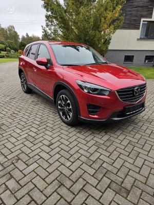 Red Mazda CX-5 2015 in Utena, with an engine capacity of 2.20 L and mileage of 97 thousand km for 13700 €, photo  on AUTOMOTO.COM.LV
