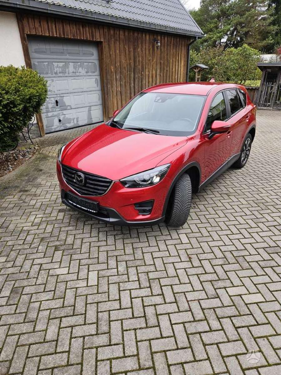 Red Mazda CX-5 2015 in Utena, with an engine capacity of 2.20 L and mileage of 97 thousand km for 13700 €, photo 2 on AUTOMOTO.COM.LV