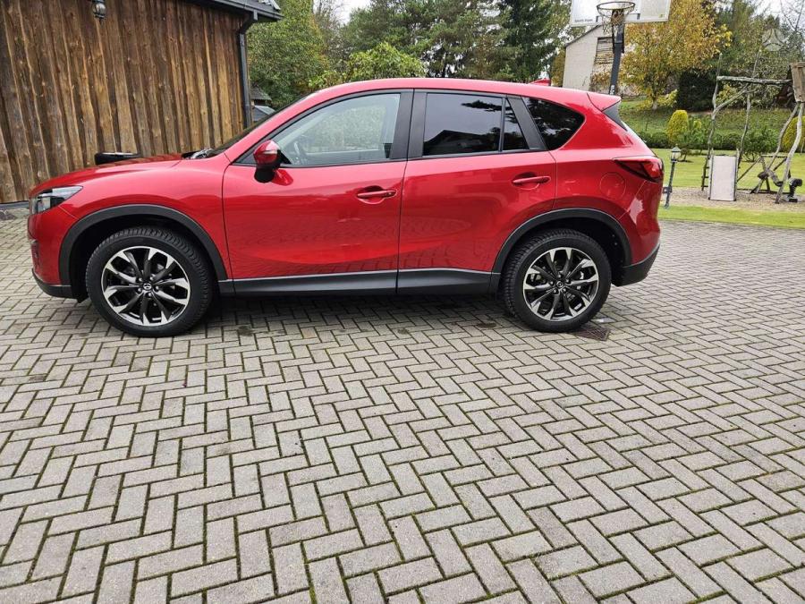 Red Mazda CX-5 2015 in Utena, with an engine capacity of 2.20 L and mileage of 97 thousand km for 13700 €, photo 3 on AUTOMOTO.COM.LV