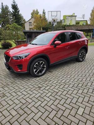 Red Mazda CX-5 2015 in Utena, with an engine capacity of 2.20 L and mileage of 97 thousand km for 13700 €, photo 6 on AUTOMOTO.COM.LV