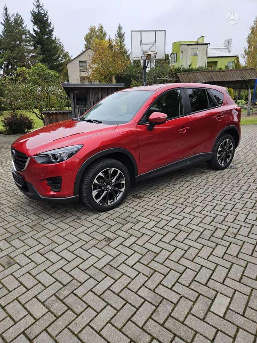 Red Mazda CX-5 2015 in Utena, with an engine capacity of 2.20 L and mileage of 97 thousand km for 13700 €, photo 6 on AUTOMOTO.COM.LV