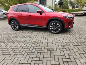 Red Mazda CX-5 2015 in Utena, with an engine capacity of 2.20 L and mileage of 97 thousand km for 13700 €, photo 7 on AUTOMOTO.COM.LV