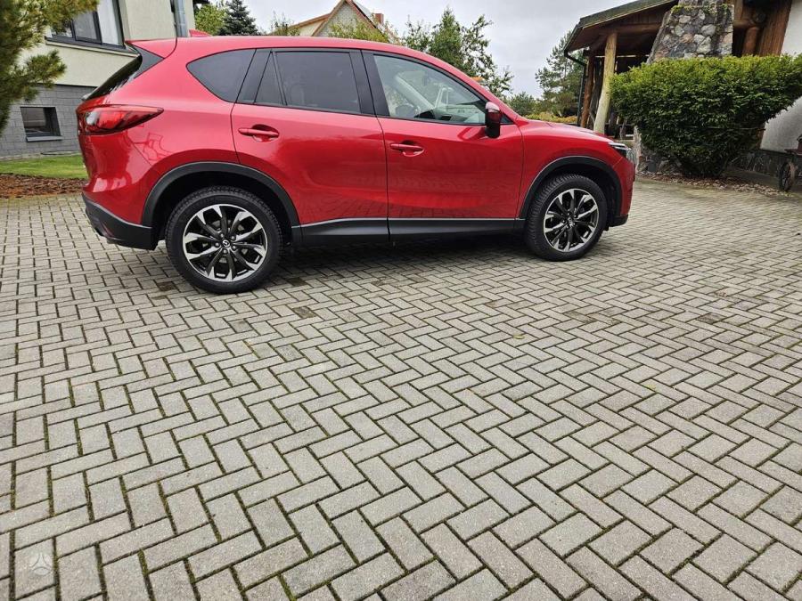 Red Mazda CX-5 2015 in Utena, with an engine capacity of 2.20 L and mileage of 97 thousand km for 13700 €, photo 8 on AUTOMOTO.COM.LV