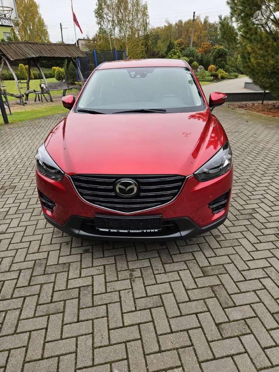 Red Mazda CX-5 2015 in Utena, with an engine capacity of 2.20 L and mileage of 97 thousand km for 13700 €, photo 9 on AUTOMOTO.COM.LV