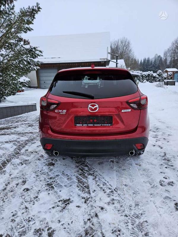 Red Mazda CX-5 2015 in Utena, with an engine capacity of 2.20 L and mileage of 98 thousand km for 13700 €, photo 2 on AUTOMOTO.COM.LV