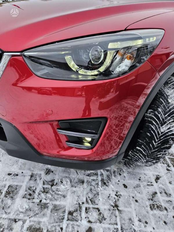 Red Mazda CX-5 2015 in Utena, with an engine capacity of 2.20 L and mileage of 98 thousand km for 13700 €, photo 4 on AUTOMOTO.COM.LV