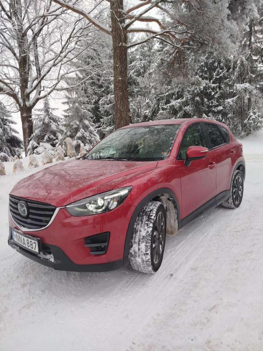 Red Mazda CX-5 2015 in Utena, with an engine capacity of 2.19 L and mileage of 179 thousand km for 10700 €, photo 2 on AUTOMOTO.COM.LV