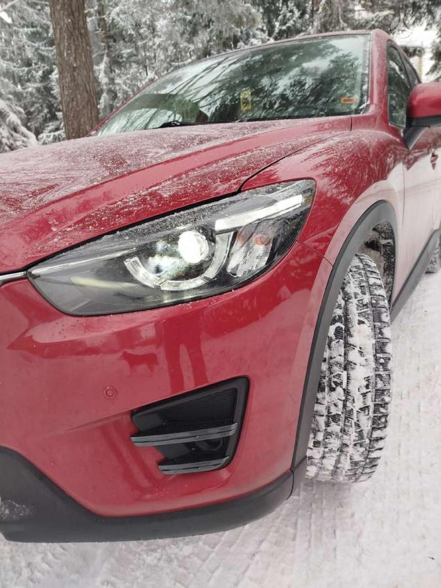 Red Mazda CX-5 2015 in Utena, with an engine capacity of 2.19 L and mileage of 179 thousand km for 10700 €, photo 7 on AUTOMOTO.COM.LV