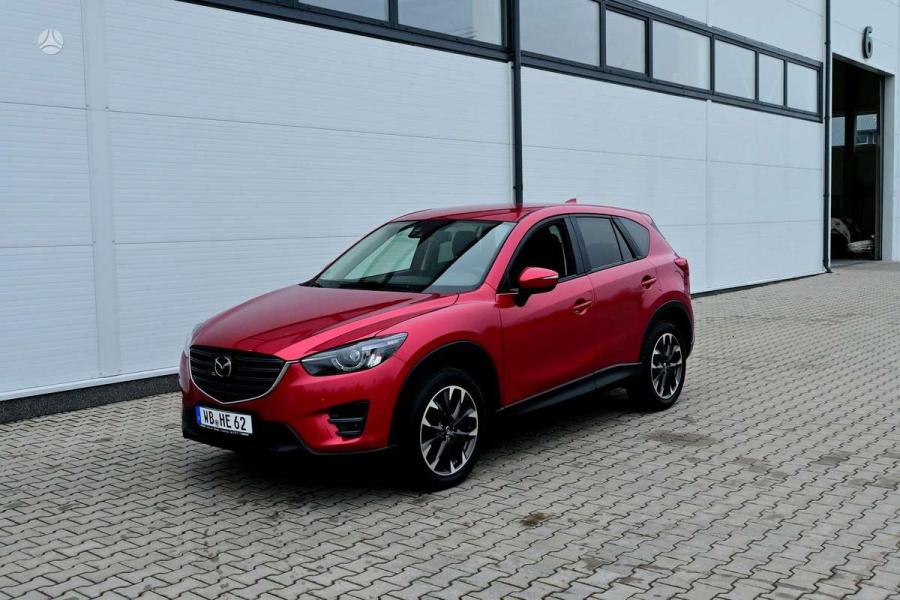 Red Mazda CX-5 2015 in Kretinga, with an engine capacity of 2.19 L and mileage of 261 thousand km for 9999 €, photo 13 on AUTOMOTO.COM.LV