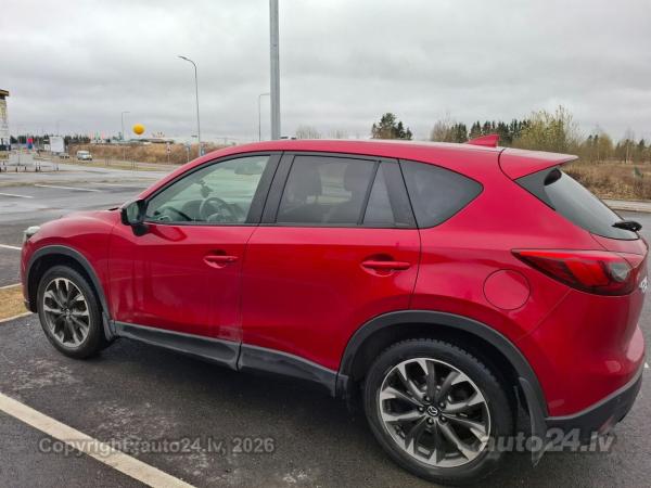 Sarkans Mazda CX-5 2015 Tallina, ar dzinēja tilpumu 2.10 L un nobraukumu 95 tūkst. km par 16800 €, foto 2 vietnē AUTOMOTO.COM.LV