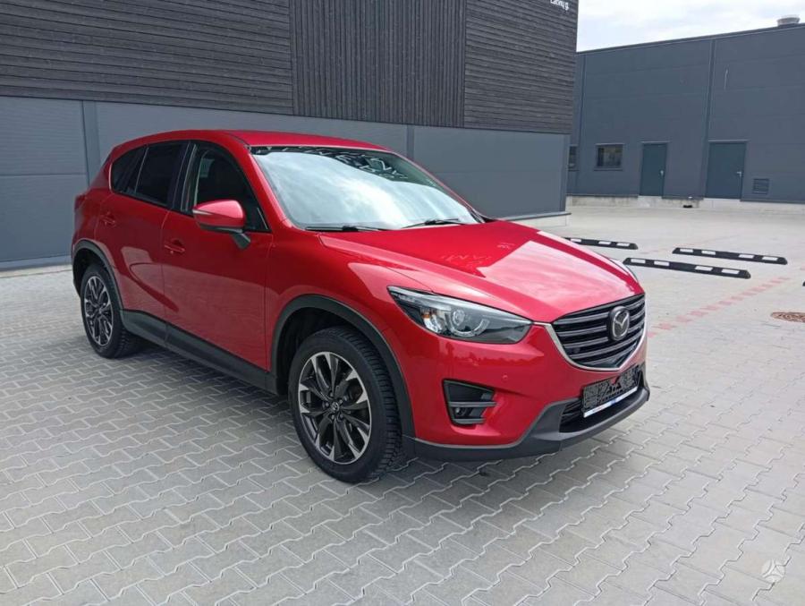 Red Mazda CX-5 2015 in Siauliai, with an engine capacity of 2.20 L and mileage of 194 thousand km for 12400 €, photo 1 on AUTOMOTO.COM.LV