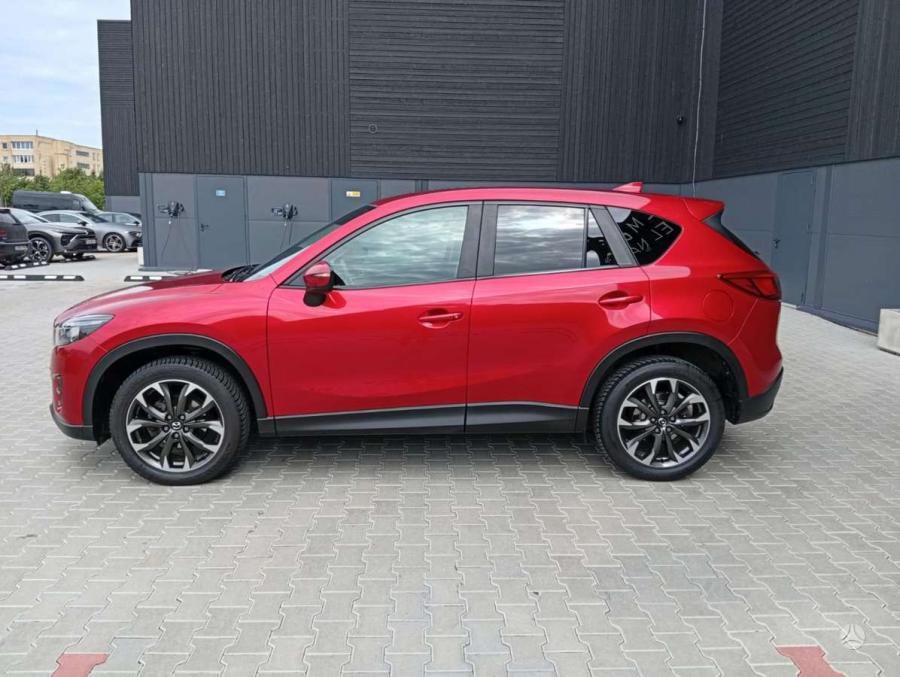 Red Mazda CX-5 2015 in Siauliai, with an engine capacity of 2.20 L and mileage of 194 thousand km for 12400 €, photo 5 on AUTOMOTO.COM.LV