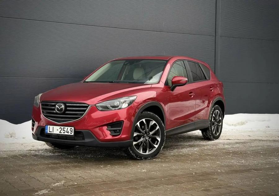 Red Mazda CX-5 2015 in Riga, with an engine capacity of 2.20 L and mileage of 243 thousand km for 8990 €, photo 1 on AUTOMOTO.COM.LV