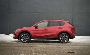 Red Mazda CX-5 2015 in Riga, with an engine capacity of 2.20 L and mileage of 243 thousand km for 8990 €, photo 3 on AUTOMOTO.COM.LV