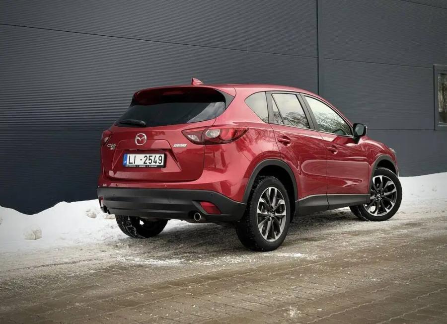 Red Mazda CX-5 2015 in Riga, with an engine capacity of 2.20 L and mileage of 243 thousand km for 8990 €, photo 7 on AUTOMOTO.COM.LV