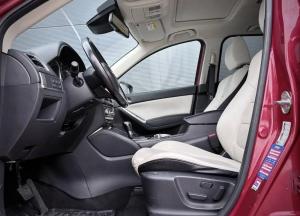 Red Mazda CX-5 2015 in Riga, with an engine capacity of 2.20 L and mileage of 243 thousand km for 8990 €, photo 8 on AUTOMOTO.COM.LV