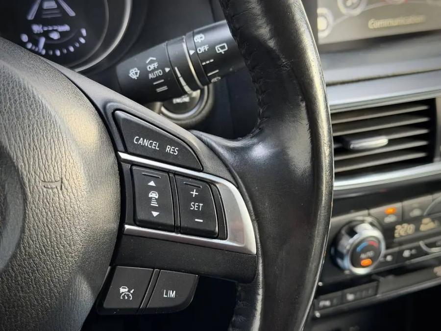 Red Mazda CX-5 2015 in Riga, with an engine capacity of 2.20 L and mileage of 243 thousand km for 8990 €, photo 16 on AUTOMOTO.COM.LV