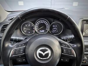 Red Mazda CX-5 2015 in Riga, with an engine capacity of 2.20 L and mileage of 243 thousand km for 8990 €, photo 17 on AUTOMOTO.COM.LV