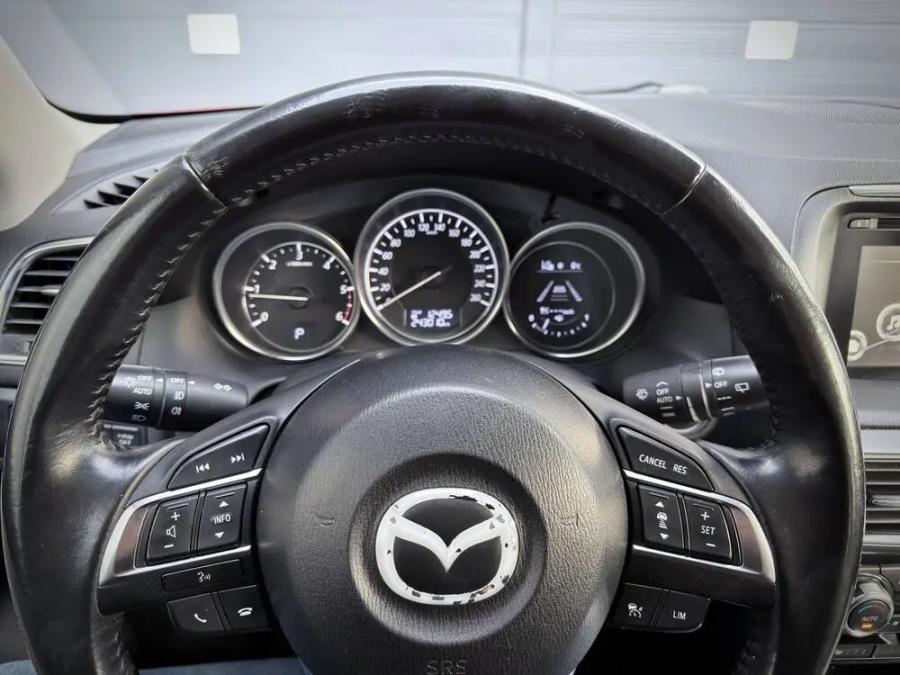 Red Mazda CX-5 2015 in Riga, with an engine capacity of 2.20 L and mileage of 243 thousand km for 8990 €, photo 17 on AUTOMOTO.COM.LV