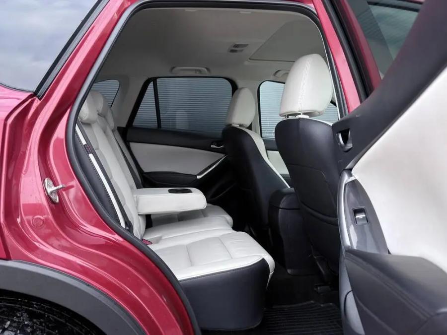 Red Mazda CX-5 2015 in Riga, with an engine capacity of 2.20 L and mileage of 243 thousand km for 8990 €, photo 23 on AUTOMOTO.COM.LV
