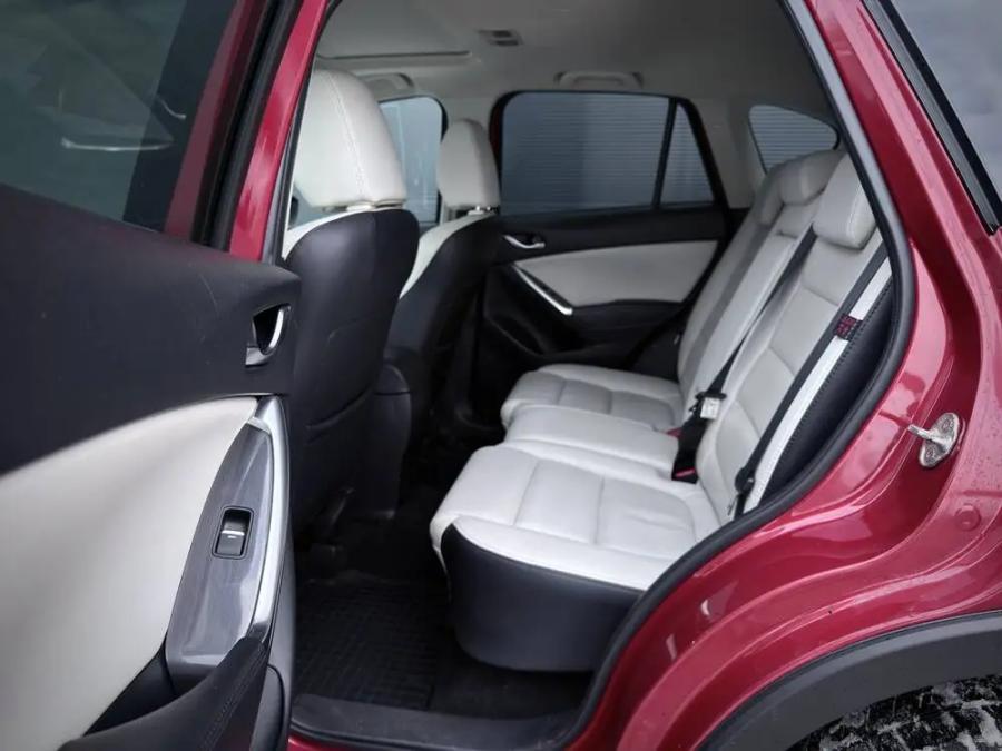Red Mazda CX-5 2015 in Riga, with an engine capacity of 2.20 L and mileage of 243 thousand km for 8990 €, photo 25 on AUTOMOTO.COM.LV