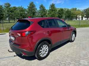 Red Mazda CX-5 2015 in Klaipeda, with an engine capacity of 2.20 L and mileage of 268 thousand km for 7990 €, photo 5 on AUTOMOTO.COM.LV