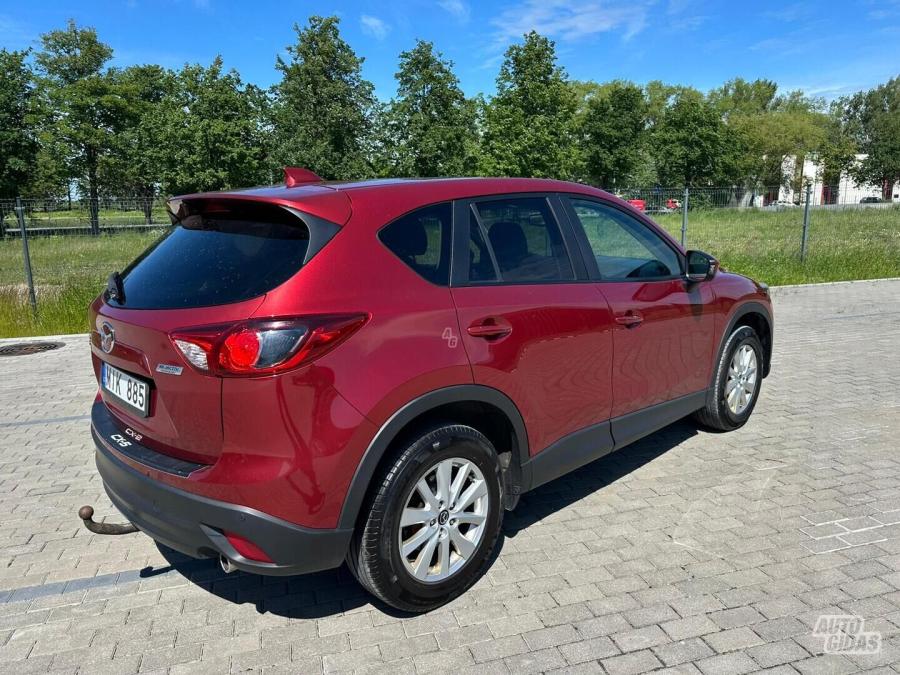 Red Mazda CX-5 2015 in Klaipeda, with an engine capacity of 2.20 L and mileage of 268 thousand km for 7990 €, photo 5 on AUTOMOTO.COM.LV