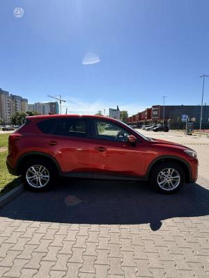 Red Mazda CX-5 2015 in Klaipeda, with an engine capacity of 2.19 L and mileage of 201 thousand km for 9200 €, photo 3 on AUTOMOTO.COM.LV