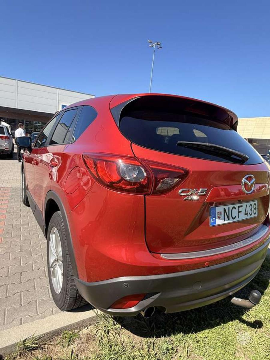 Red Mazda CX-5 2015 in Klaipeda, with an engine capacity of 2.19 L and mileage of 201 thousand km for 9200 €, photo 4 on AUTOMOTO.COM.LV