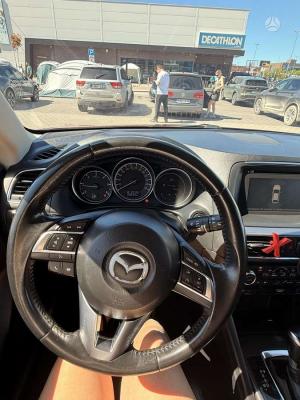 Red Mazda CX-5 2015 in Klaipeda, with an engine capacity of 2.19 L and mileage of 201 thousand km for 9200 €, photo 6 on AUTOMOTO.COM.LV