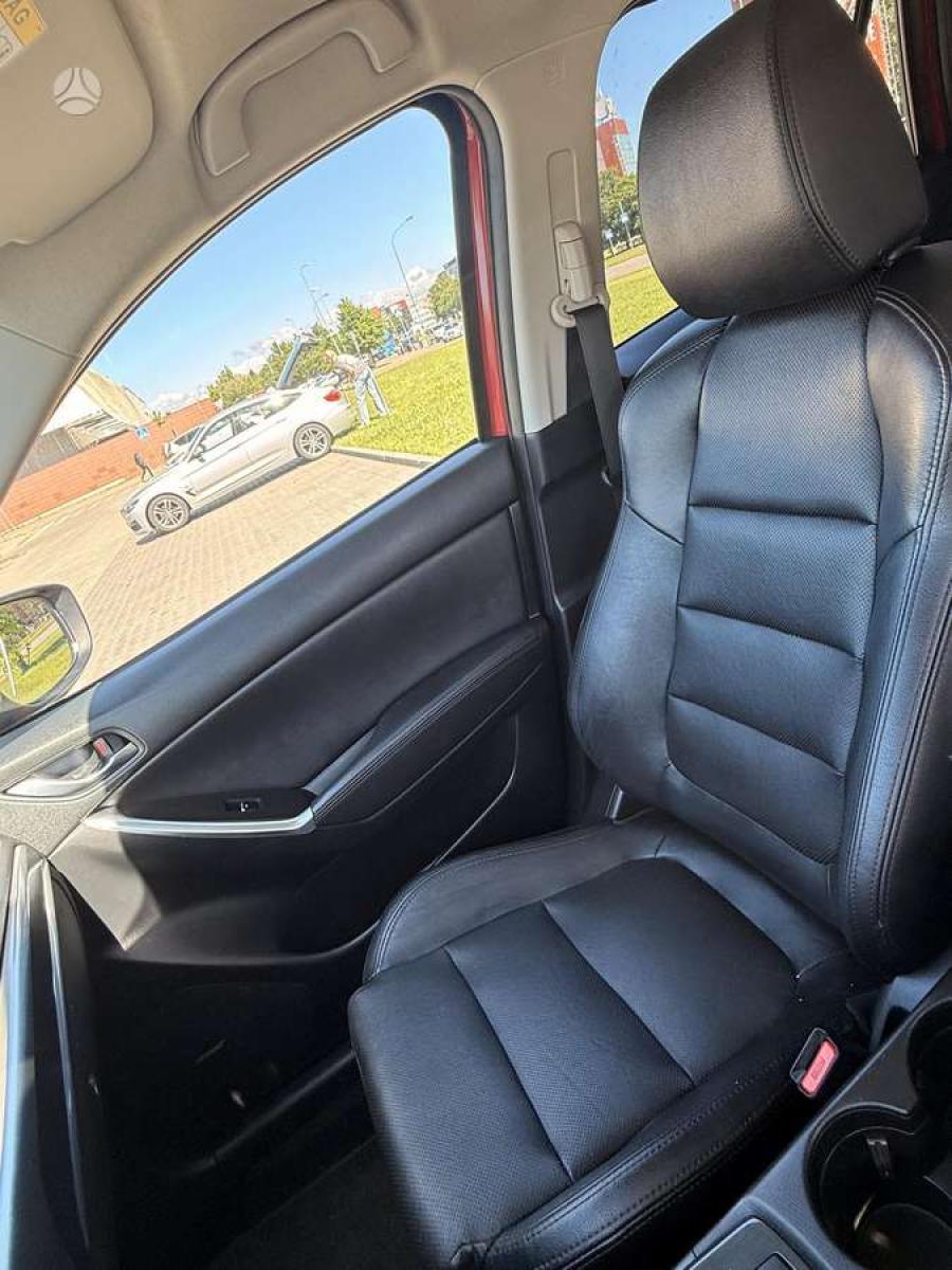 Red Mazda CX-5 2015 in Klaipeda, with an engine capacity of 2.19 L and mileage of 201 thousand km for 9200 €, photo 13 on AUTOMOTO.COM.LV