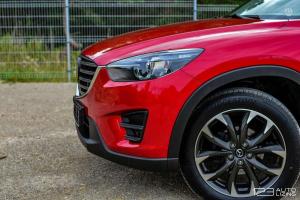 Red Mazda CX-5 2015 in Kretinga, with an engine capacity of 2.20 L and mileage of 193 thousand km for 9950 €, photo 3 on AUTOMOTO.COM.LV