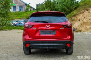 Red Mazda CX-5 2015 in Kretinga, with an engine capacity of 2.20 L and mileage of 193 thousand km for 9950 €, photo 8 on AUTOMOTO.COM.LV