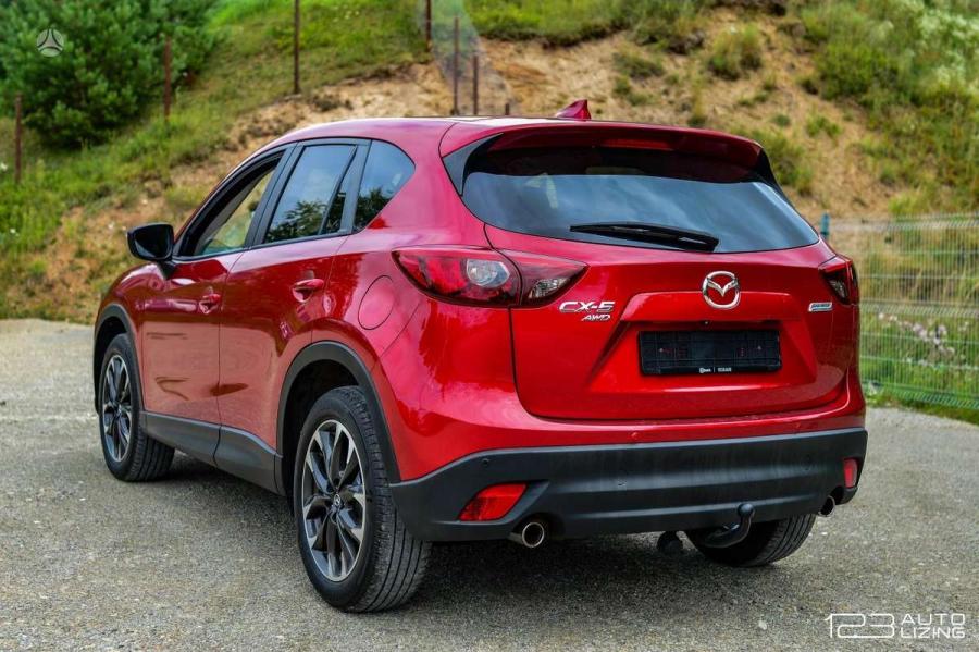 Red Mazda CX-5 2015 in Kretinga, with an engine capacity of 2.20 L and mileage of 193 thousand km for 9950 €, photo 9 on AUTOMOTO.COM.LV