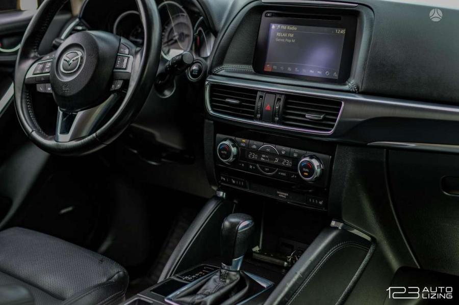 Red Mazda CX-5 2015 in Kretinga, with an engine capacity of 2.20 L and mileage of 193 thousand km for 9950 €, photo 14 on AUTOMOTO.COM.LV