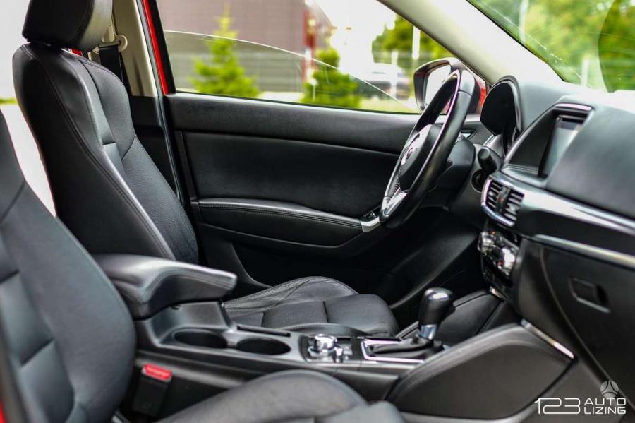 Red Mazda CX-5 2015 in Kretinga, with an engine capacity of 2.20 L and mileage of 193 thousand km for 9950 €, photo 16 on AUTOMOTO.COM.LV